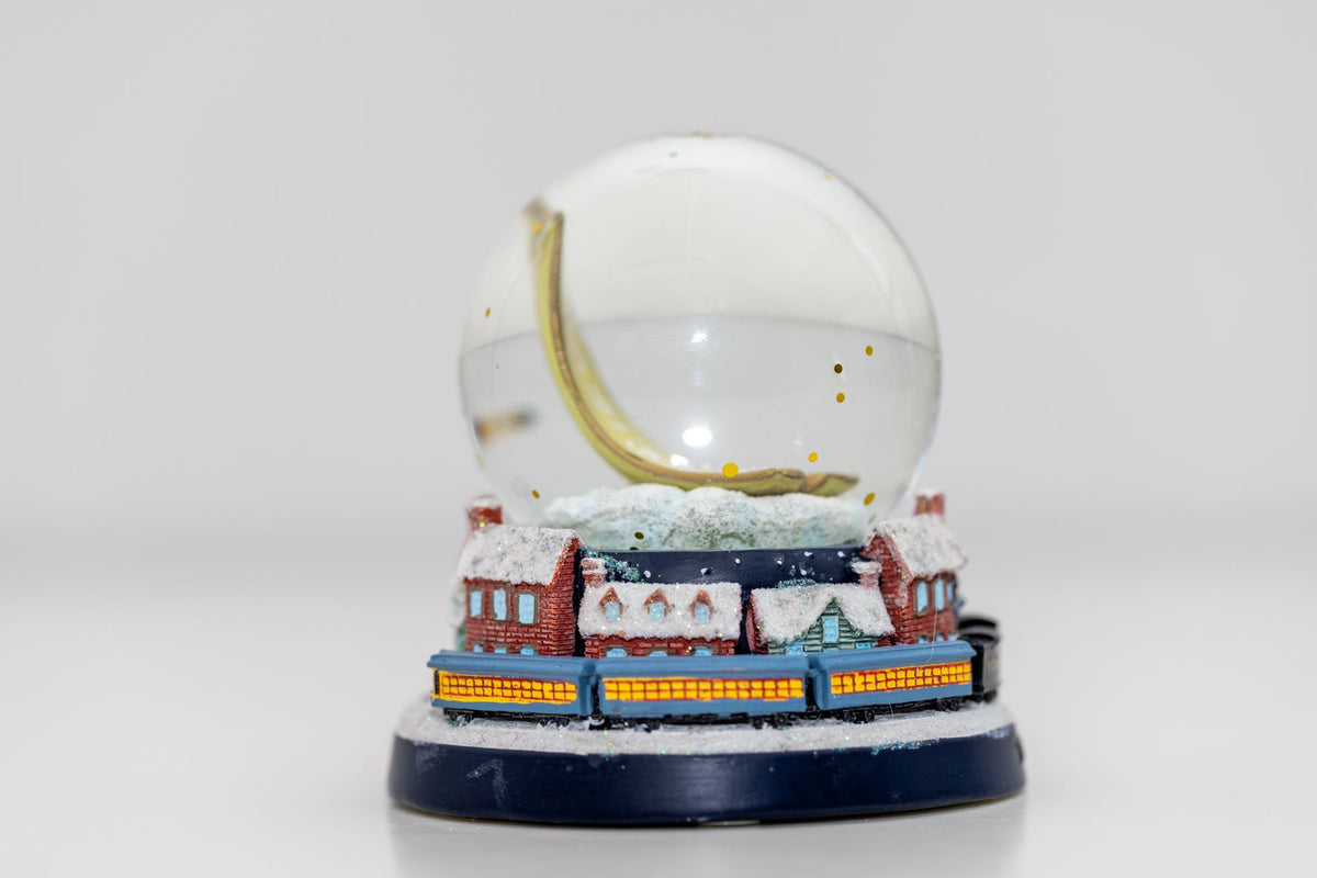 The Polar Express Lighted Golden Ticket Snow Globe – Blackstone Valley ...